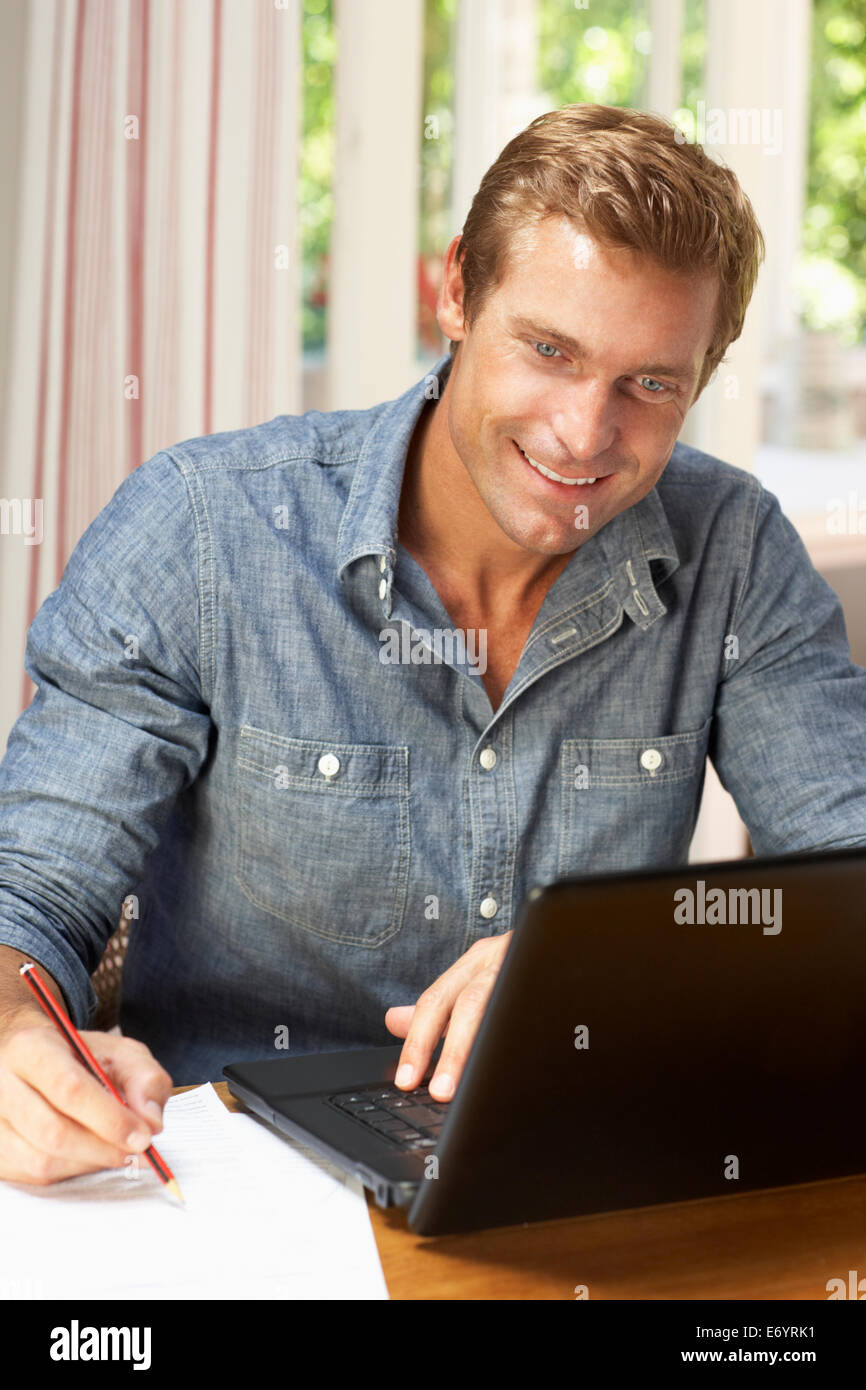 Man working in home office Stock Photo - Alamy