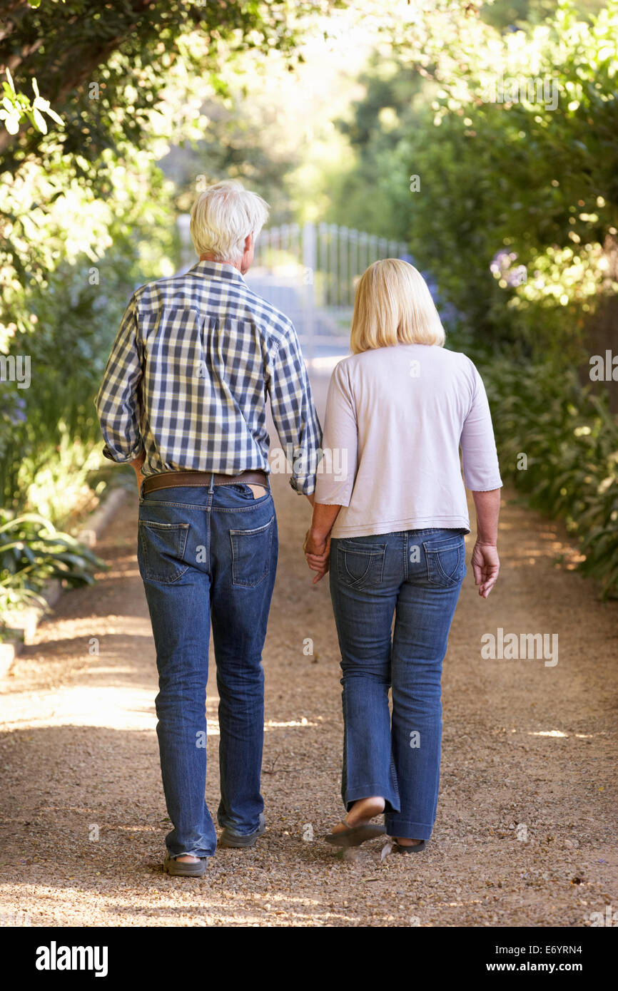 Senior couple on country walk Stock Photo - Alamy
