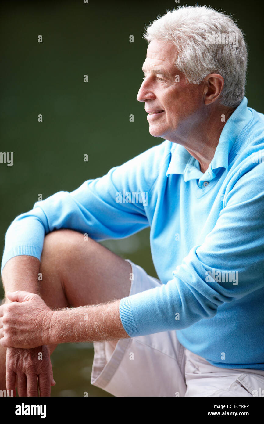 Older man sitting profile hi-res stock photography and images - Alamy