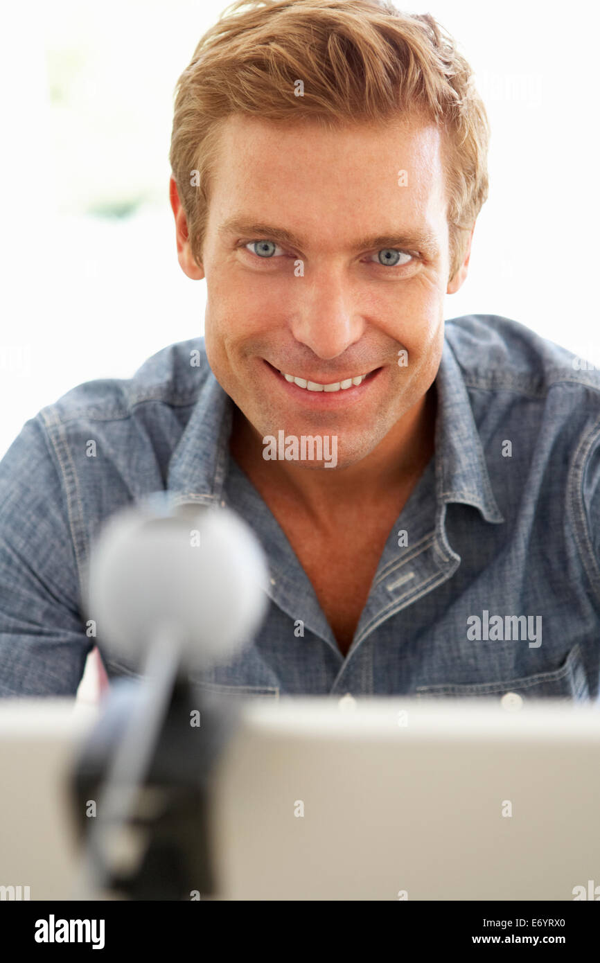 Man using skype Stock Photo - Alamy