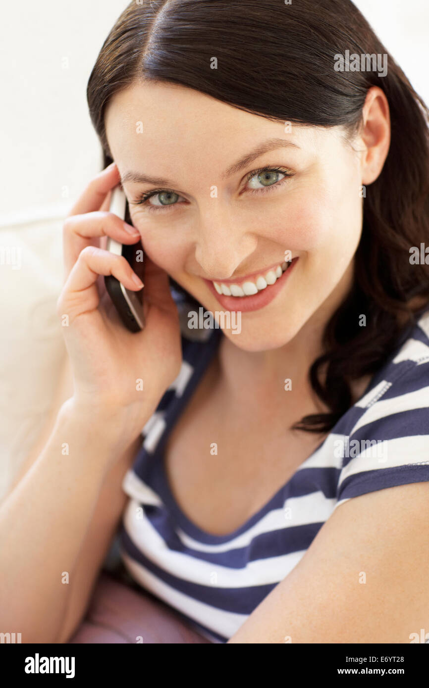 Woman talking on phone sitting hi-res stock photography and images - Alamy