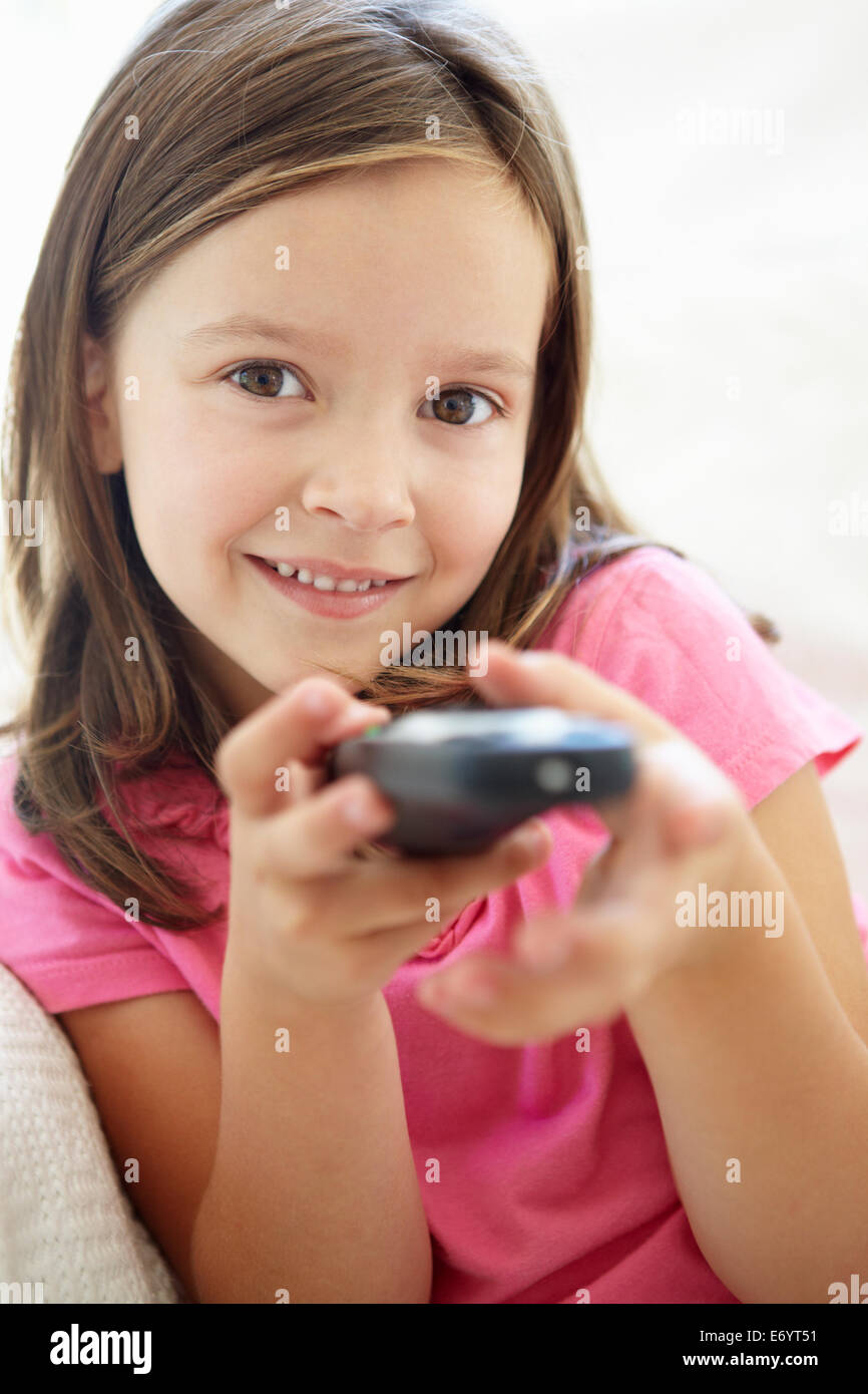 Little girl with remote control Stock Photo - Alamy