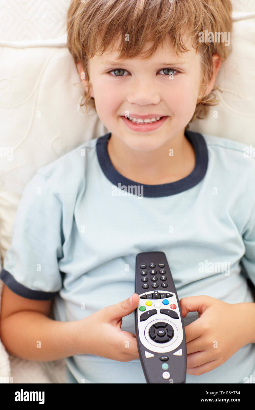 Young boy with remote control Stock Photo - Alamy