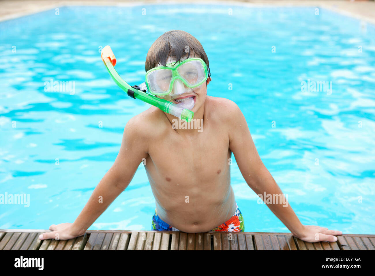 Boy in outdoor swimming pool Stock Photo - Alamy