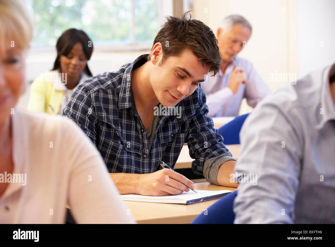 Student in class Stock Photo - Alamy