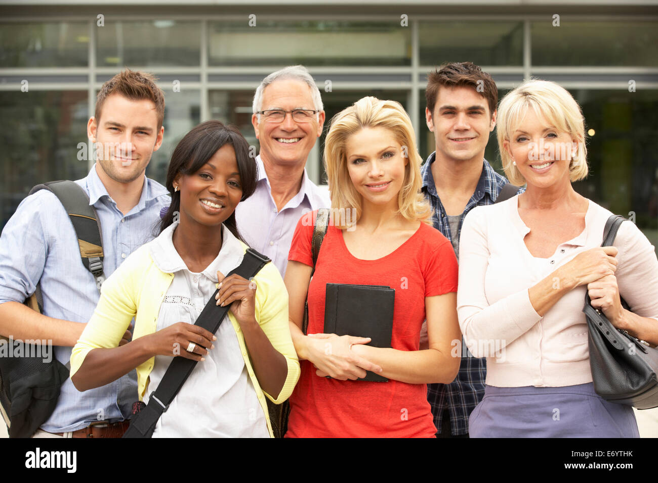 Mixed group of students outside college Stock Photo - Alamy