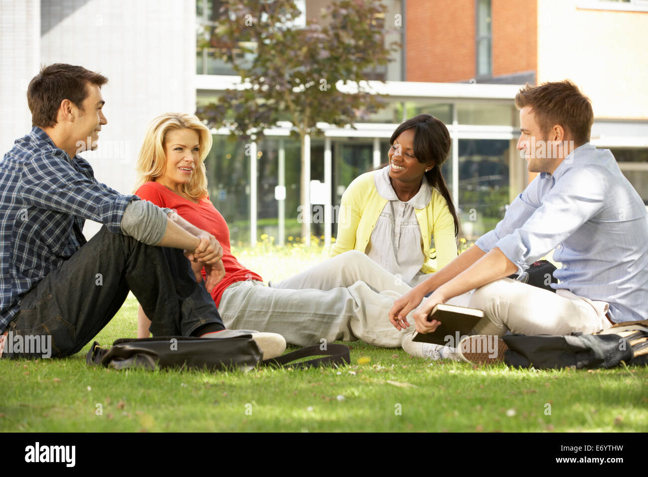 Mixed group of students outside college Stock Photo - Alamy