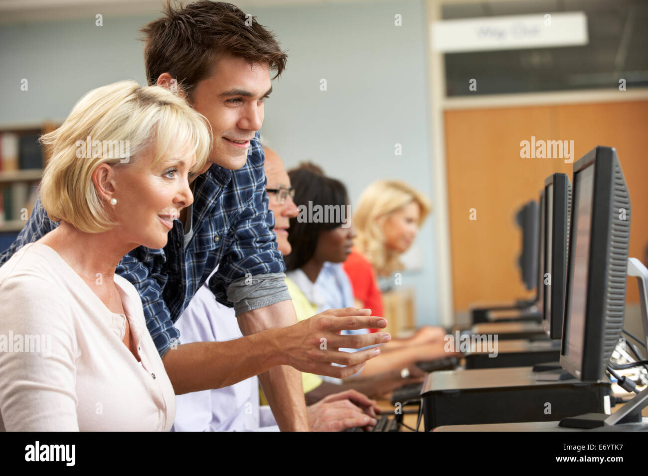 Students working on computers in library Stock Photo - Alamy