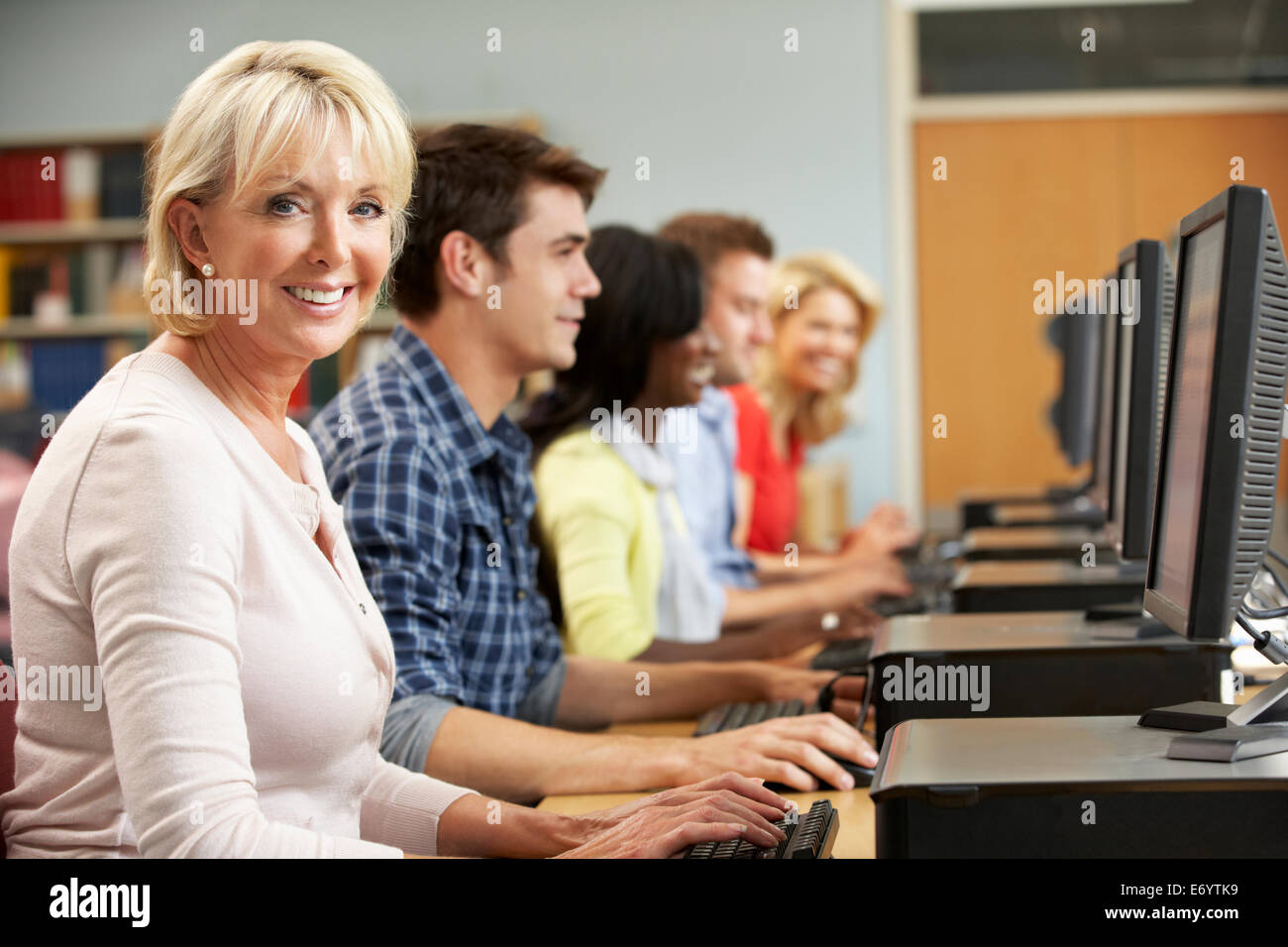 Students working on computers in library Stock Photo - Alamy