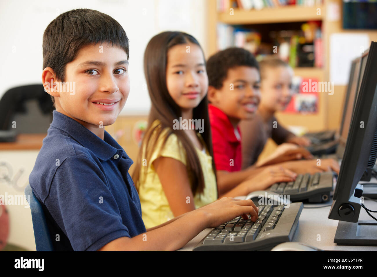 Schoolchildren working on computers Stock Photo - Alamy