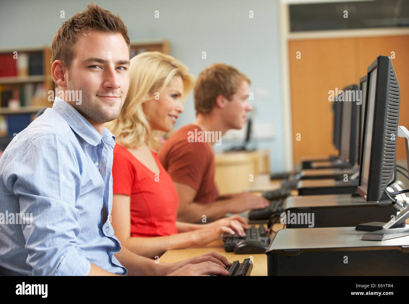 Students working on computers in library Stock Photo - Alamy
