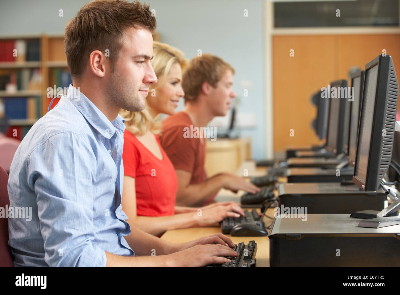 Students working on computers in library Stock Photo - Alamy