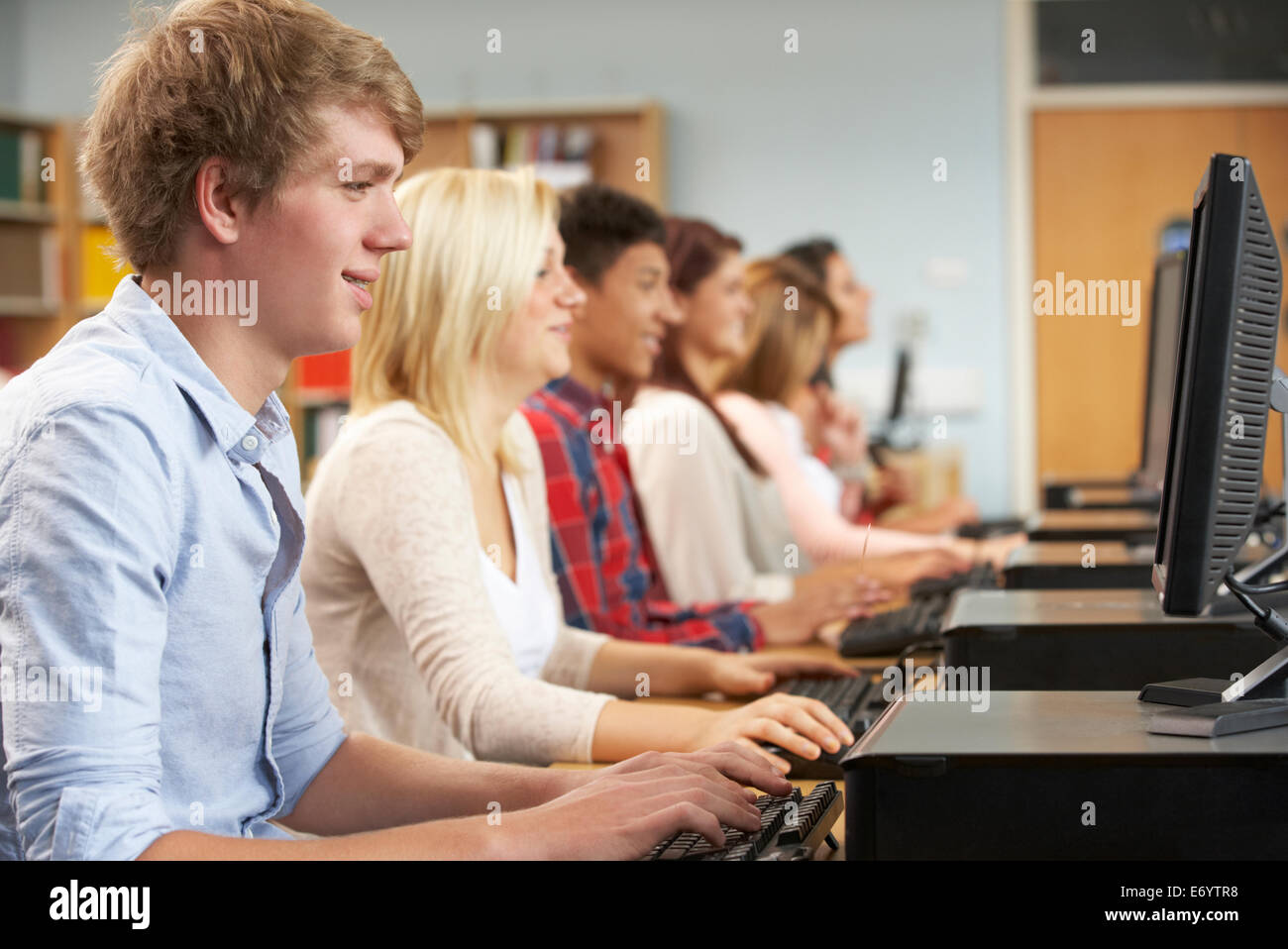 Students working on computers in library Stock Photo - Alamy
