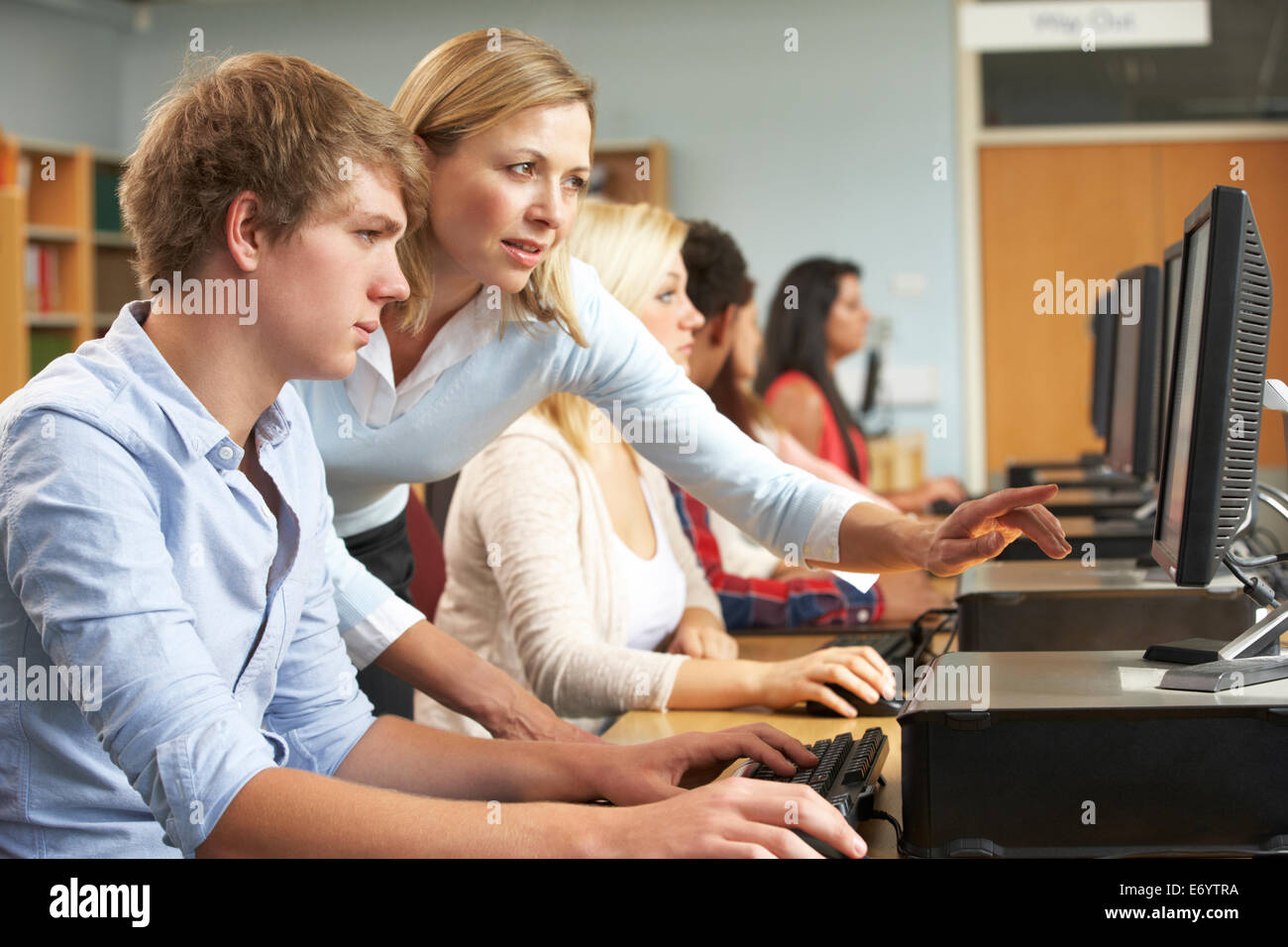 Students working on computers in library Stock Photo - Alamy