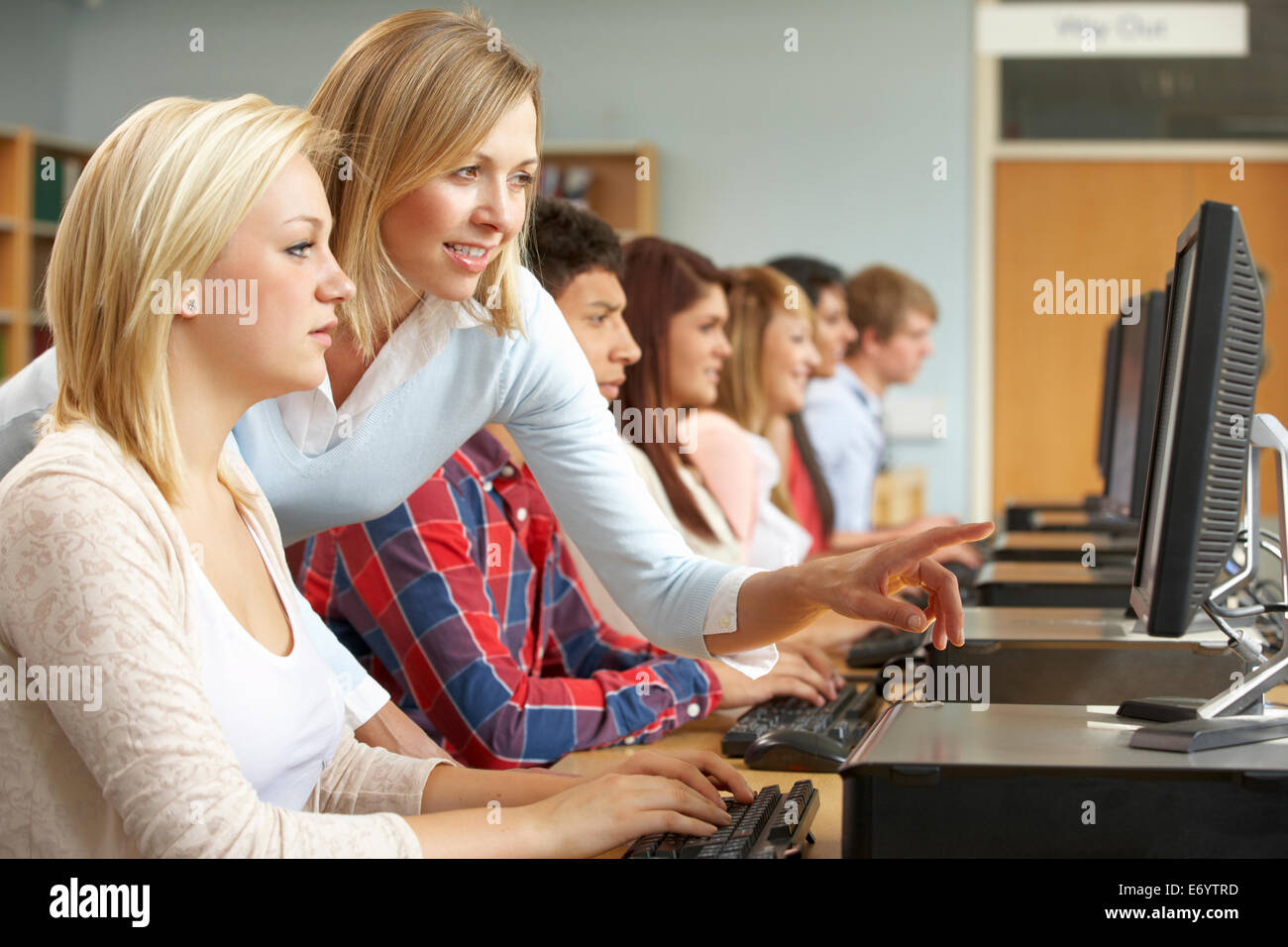 Students working on computers in library Stock Photo - Alamy