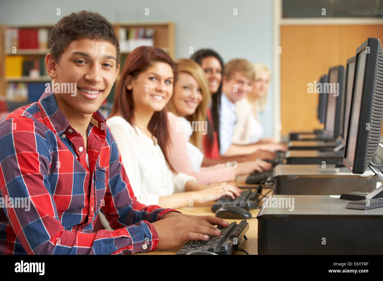 Students working on computers in library Stock Photo - Alamy