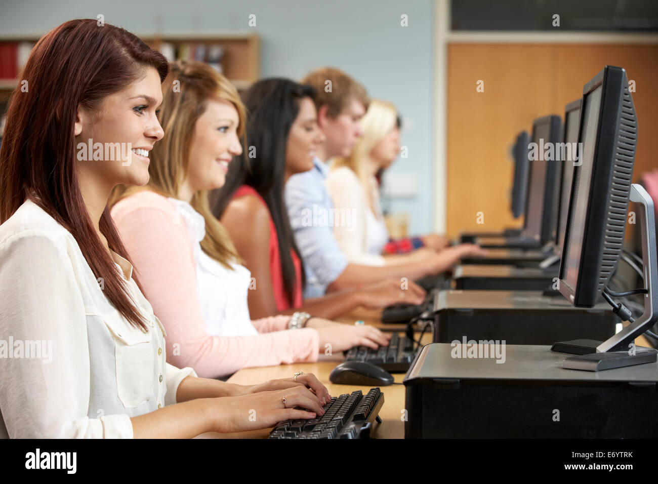 Students working on computers in library Stock Photo - Alamy