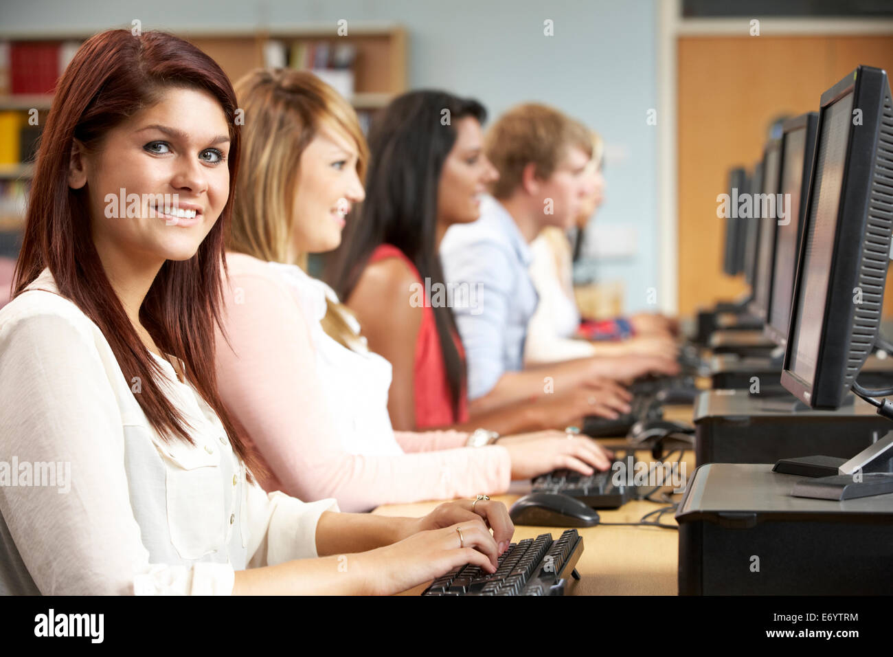Students working on computers in library Stock Photo - Alamy