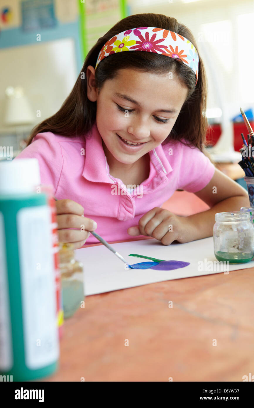Pre teen girl in art class Stock Photo - Alamy