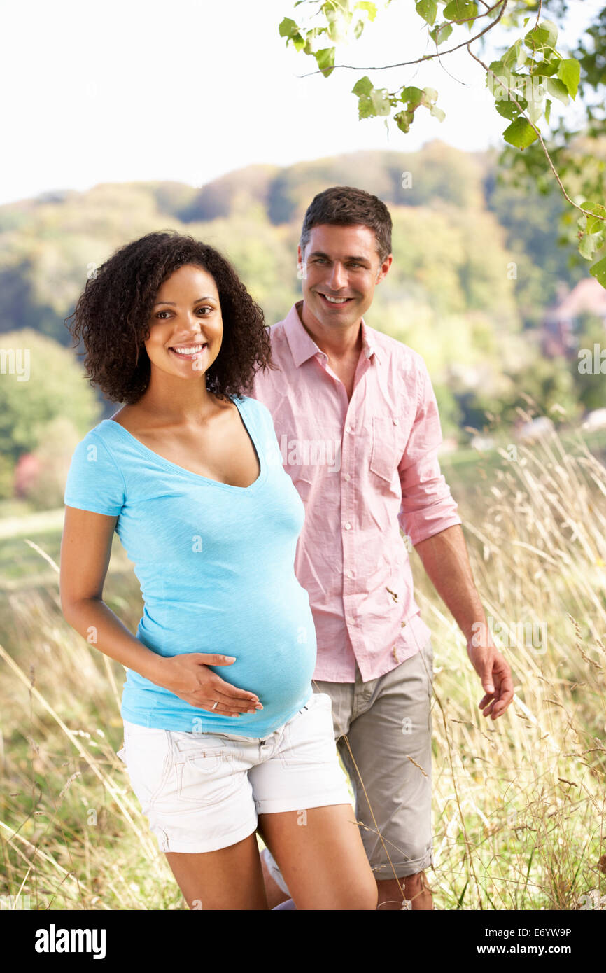 Expectant couple outdoors in countryside Stock Photo - Alamy