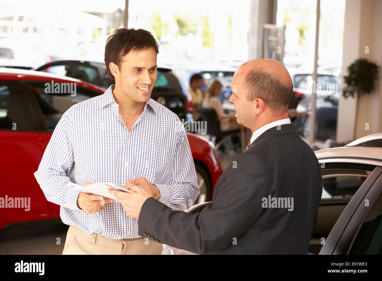 Man buying new car Stock Photo - Alamy