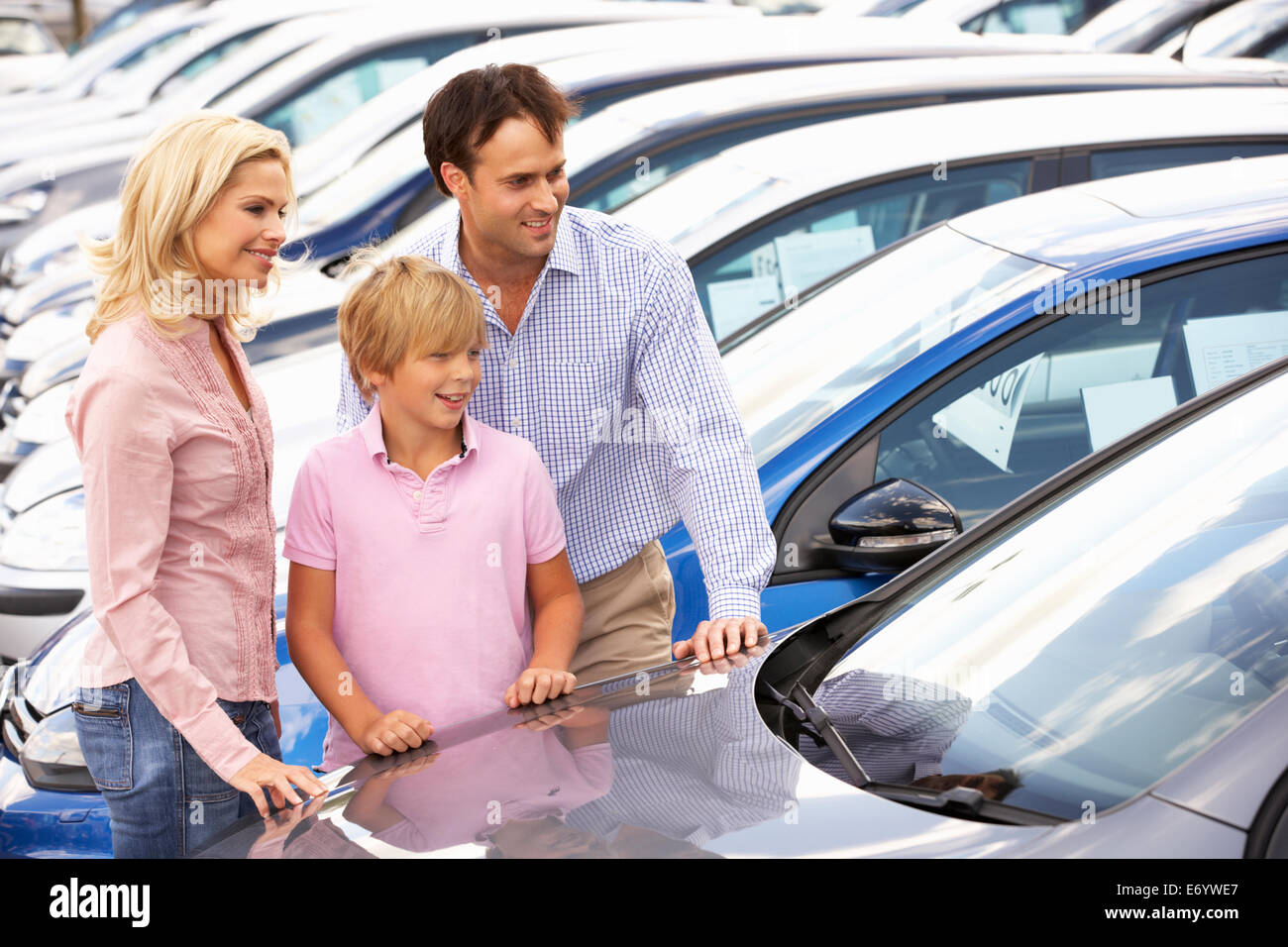 Family buying new car Stock Photo - Alamy