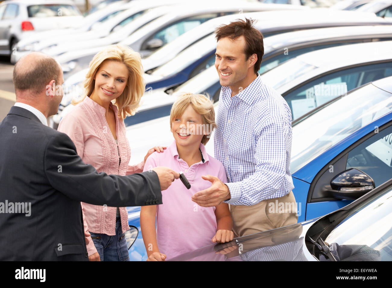 Family buying new car Stock Photo - Alamy