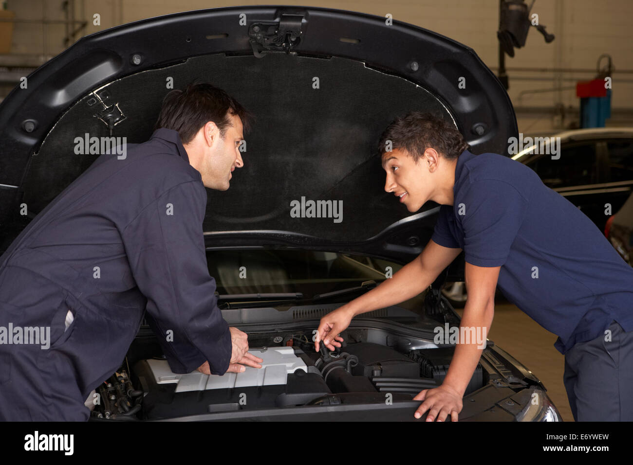 Trainee mechanic at work Stock Photo - Alamy