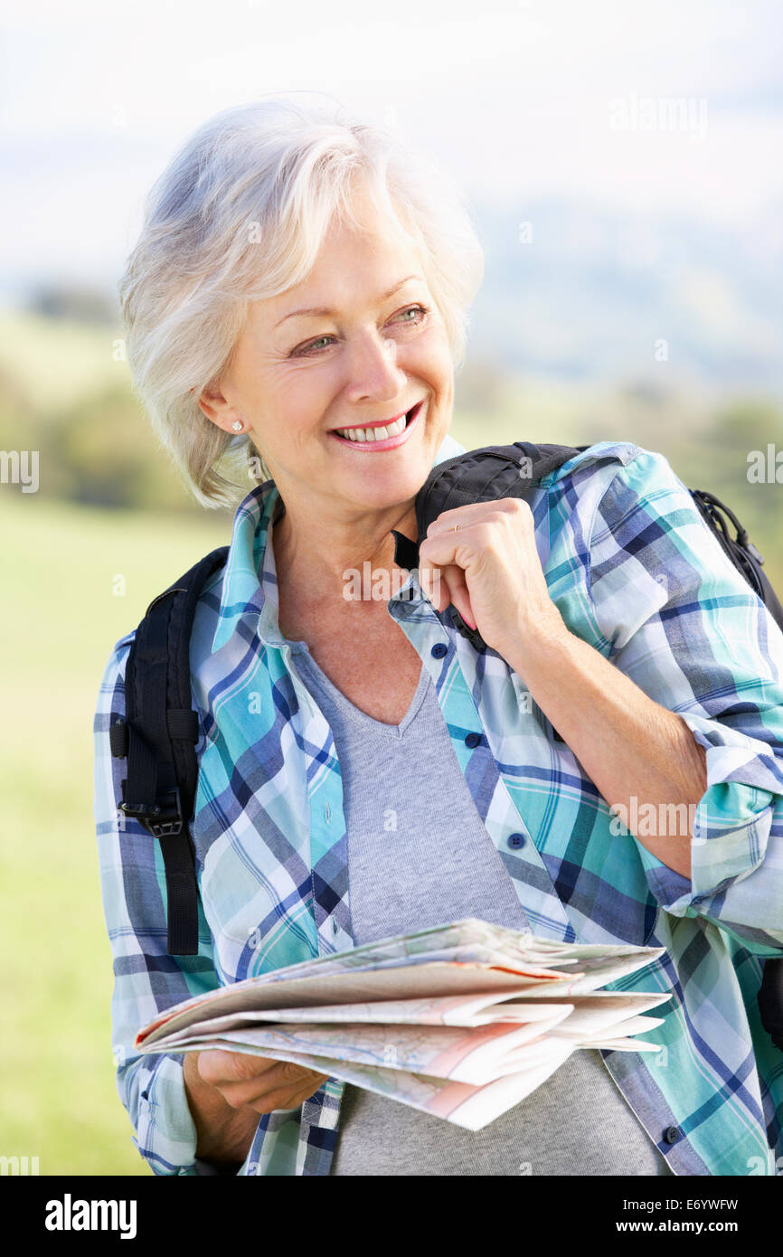 Senior woman on country walk Stock Photo - Alamy