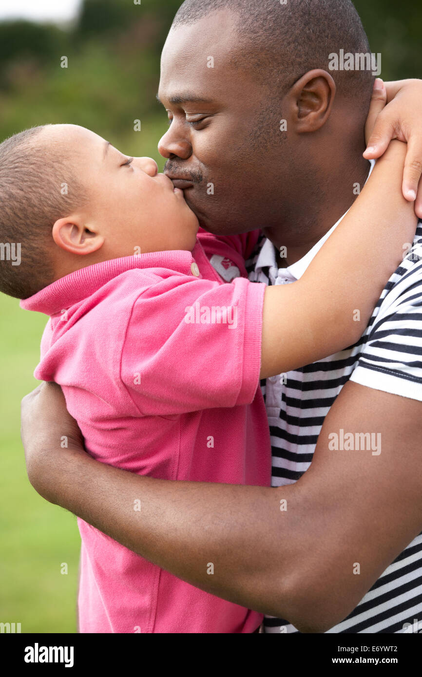 Father with Downs Syndrome son Stock Photo - Alamy