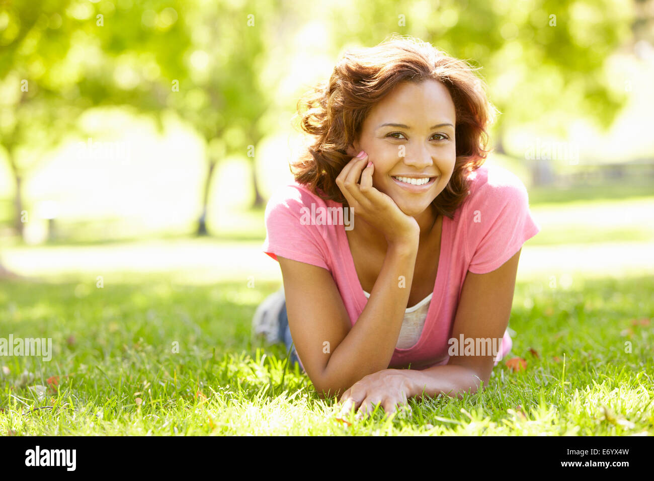 Woman laying on ground hi-res stock photography and images - Alamy