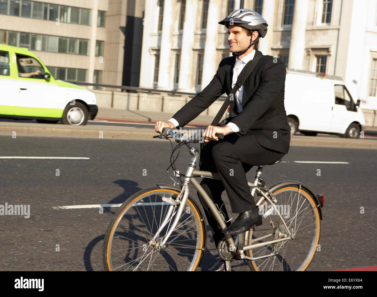 Cycling with helmet town hi-res stock photography and images - Alamy