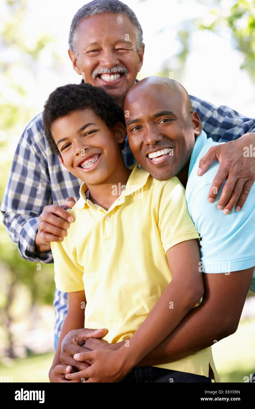 Multi-generation family in park Stock Photo - Alamy