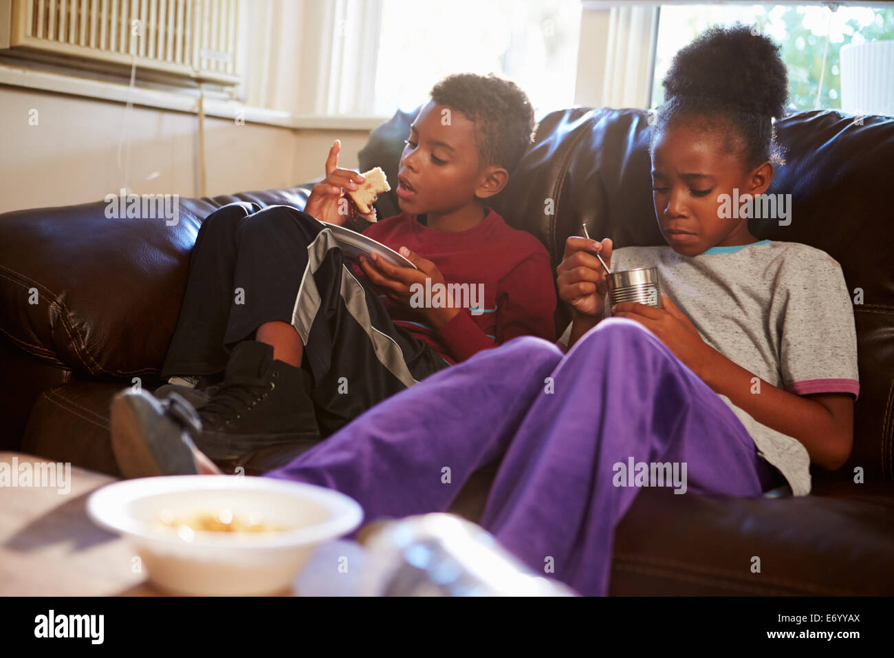 Poor children eating hi-res stock photography and images - Alamy