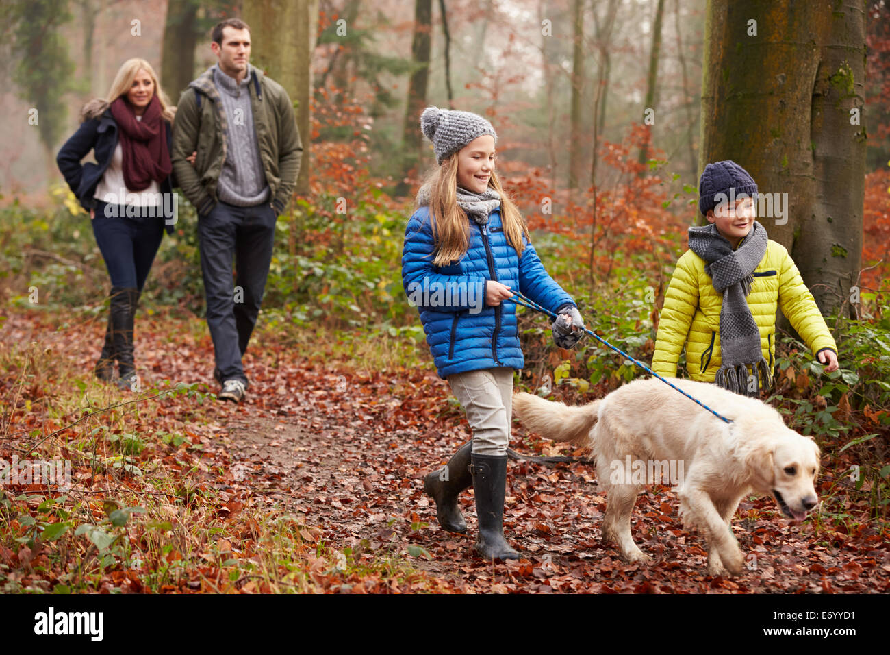 Dad and daughter walking dog hi-res stock photography and images - Alamy