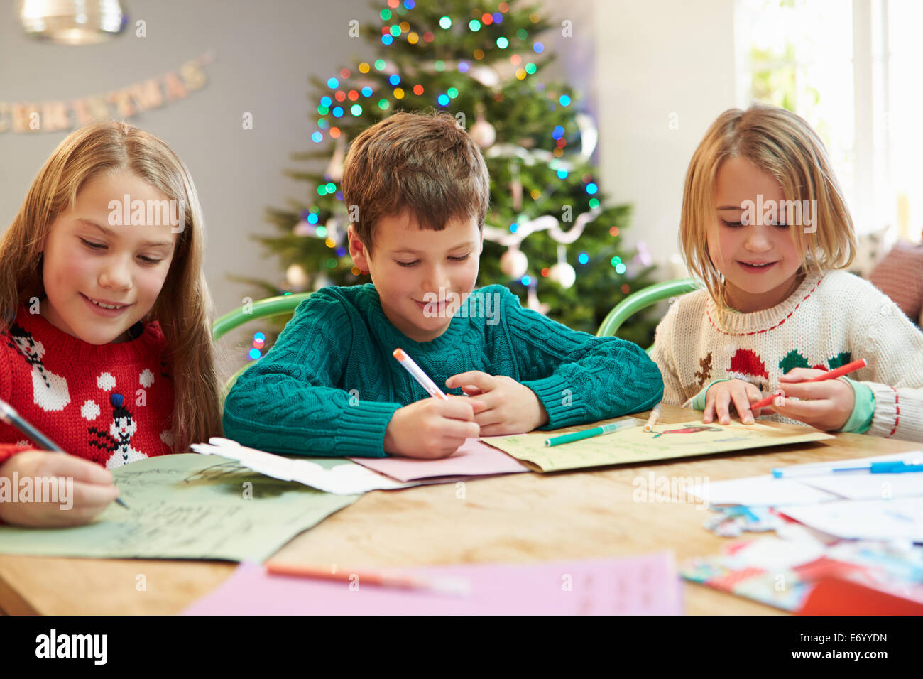 Children with letters hi-res stock photography and images - Alamy