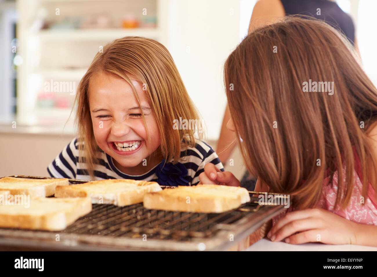Girl eating toast in hi-res stock photography and images - Alamy