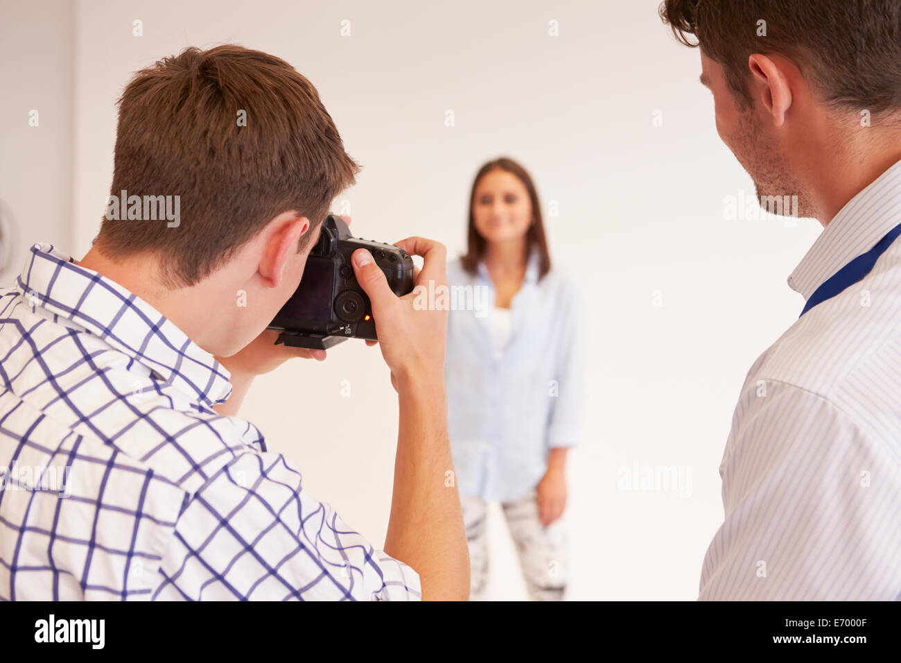 Teacher Helping College Students Studying Photography Stock Photo - Alamy