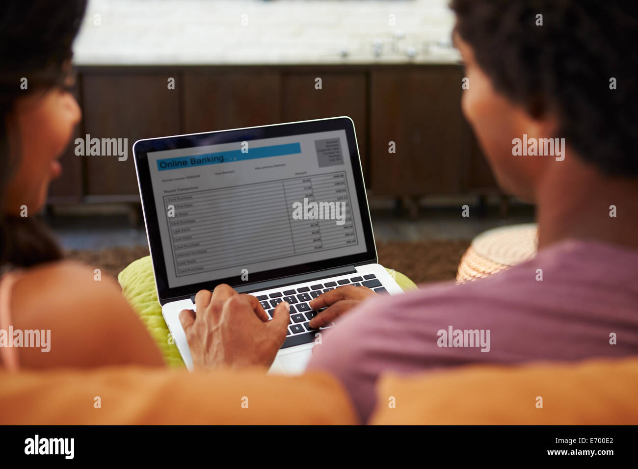 Woman laptop using online banking hi-res stock photography and images ...