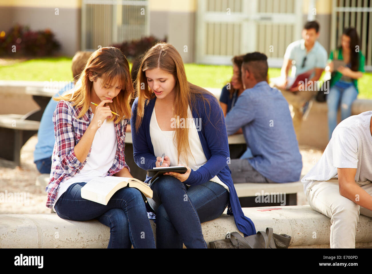Two Female High School Students Working On Campus Stock Photo - Alamy