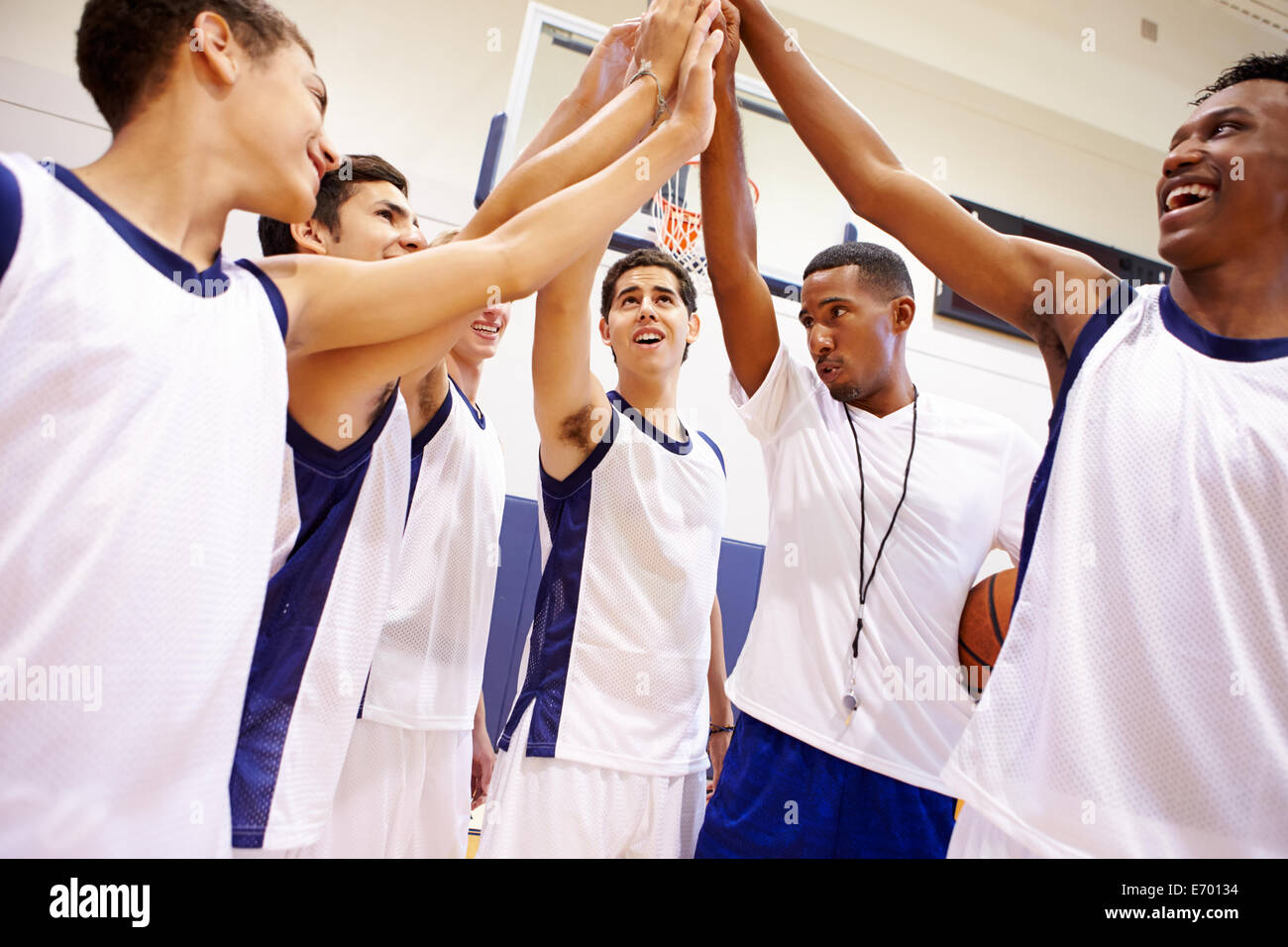 Male High School Basketball Team Having Team Talk With Coach Stock ...