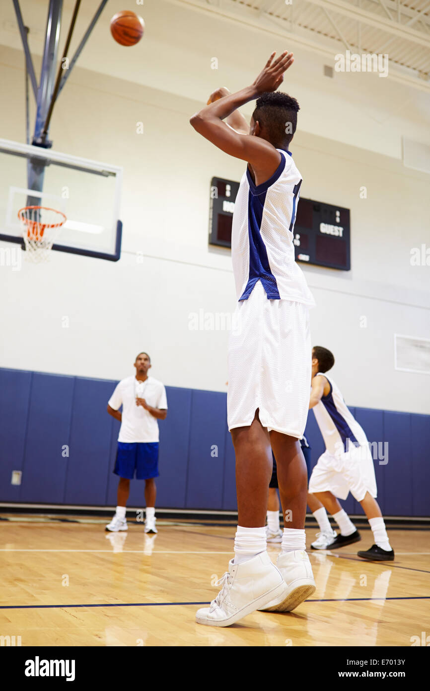 Male High School Basketball Player Shooting Penalty Stock Photo - Alamy