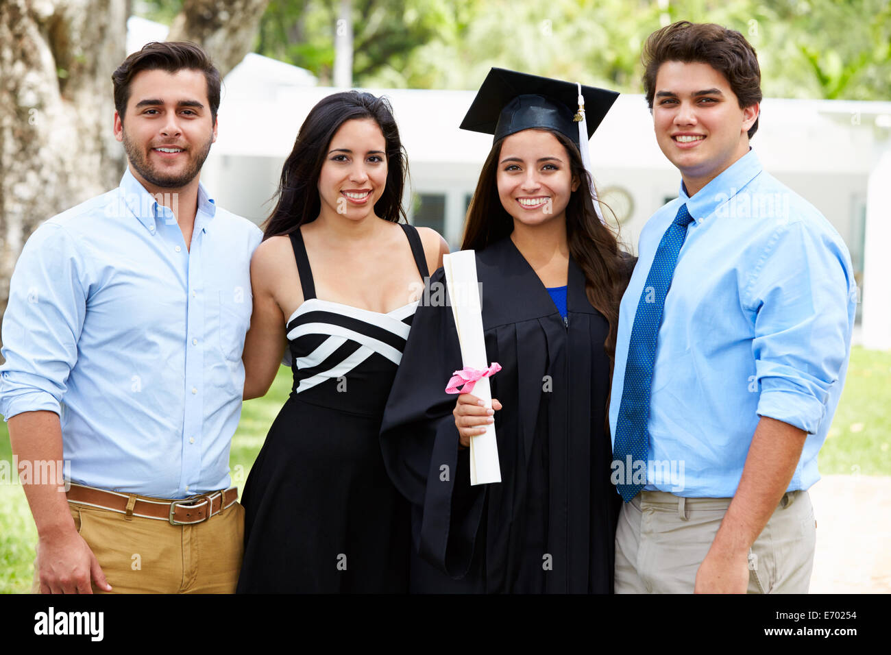 Hispanic Student And Family Celebrating Graduation Stock Photo - Alamy