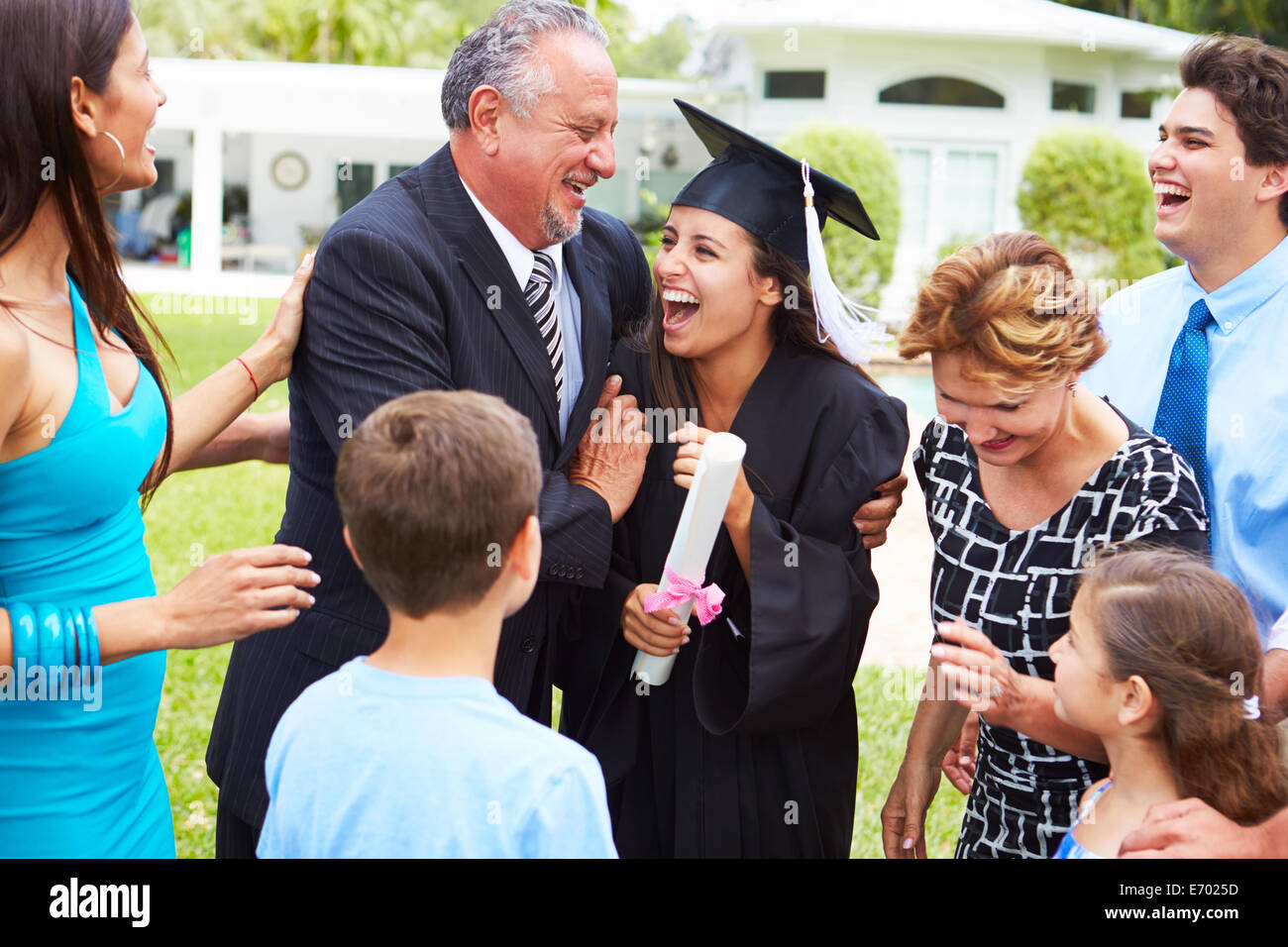 Hispanic Student And Family Celebrating Graduation Stock Photo - Alamy
