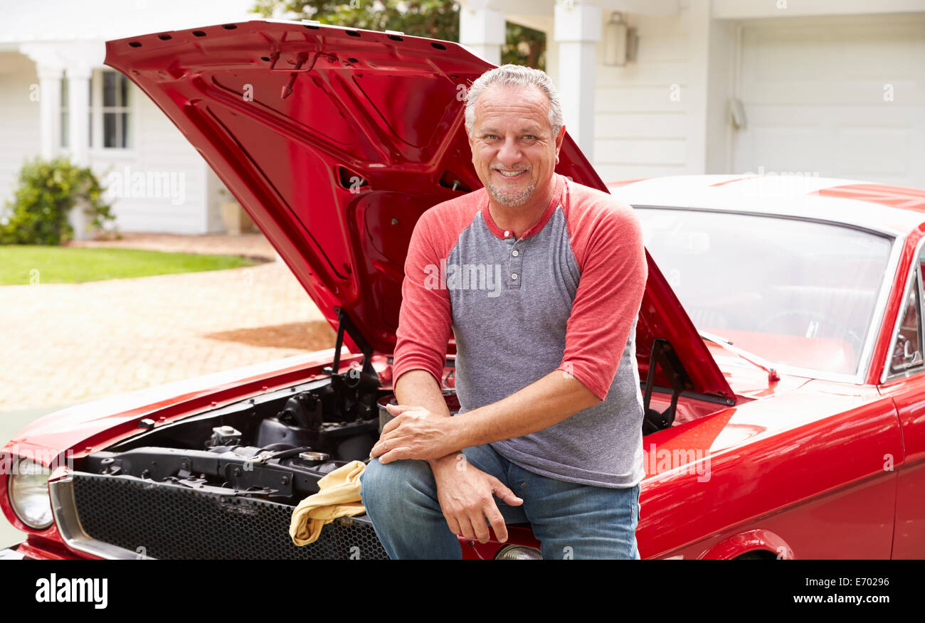 Retired Senior Man Working On Restored Classic Car Stock Photo - Alamy