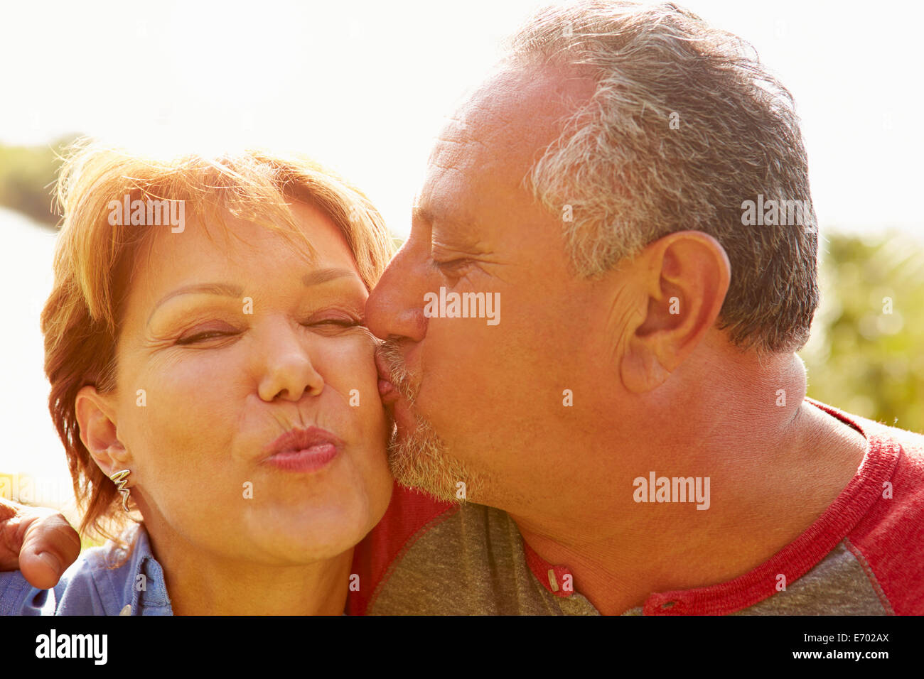 Two people kissing hi-res stock photography and images - Alamy