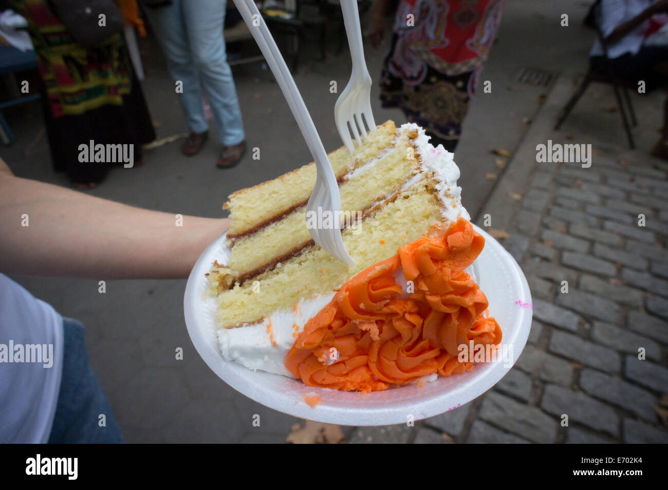 A participant displays her Virgin Island Vienna Cake at a Caribbean ...