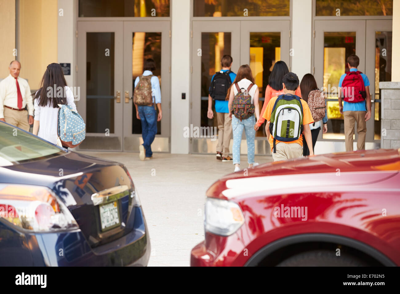 High School Students Being Dropped Off At School By Parents Stock Photo ...
