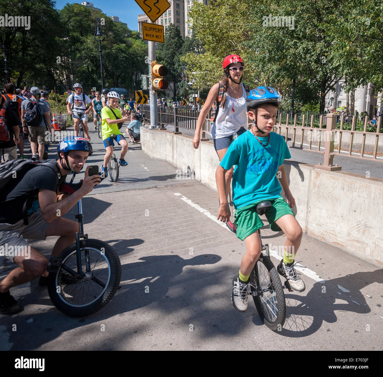 Rides a unicycle hi-res stock photography and images - Alamy