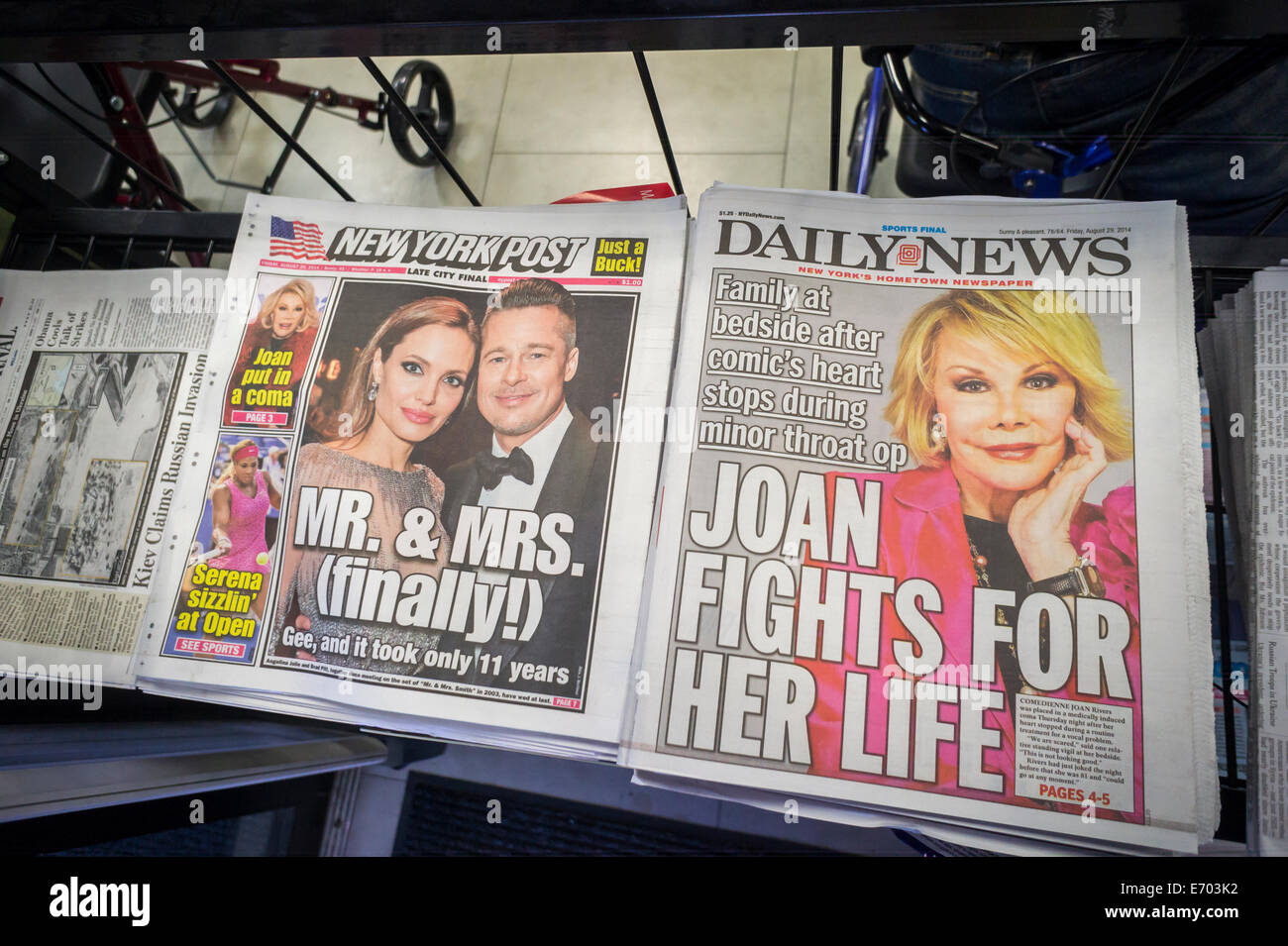 Front pages and headlines of the New York Post and Daily News tabloid ...